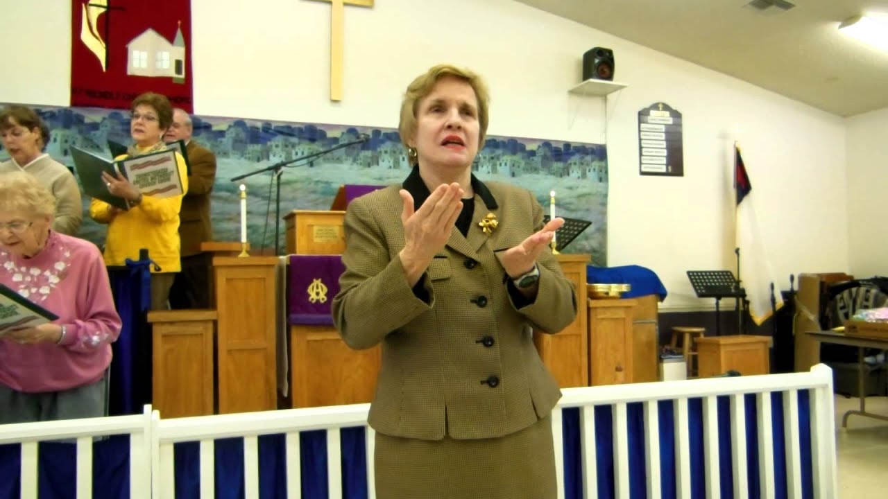 "Love Grows Here" . Choir with Carol signing. - YouTube