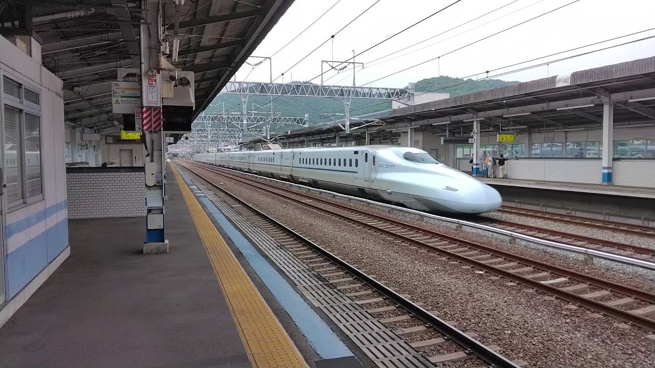 Shinkansen Speed Rush: Japan's high speed train racing through station ...