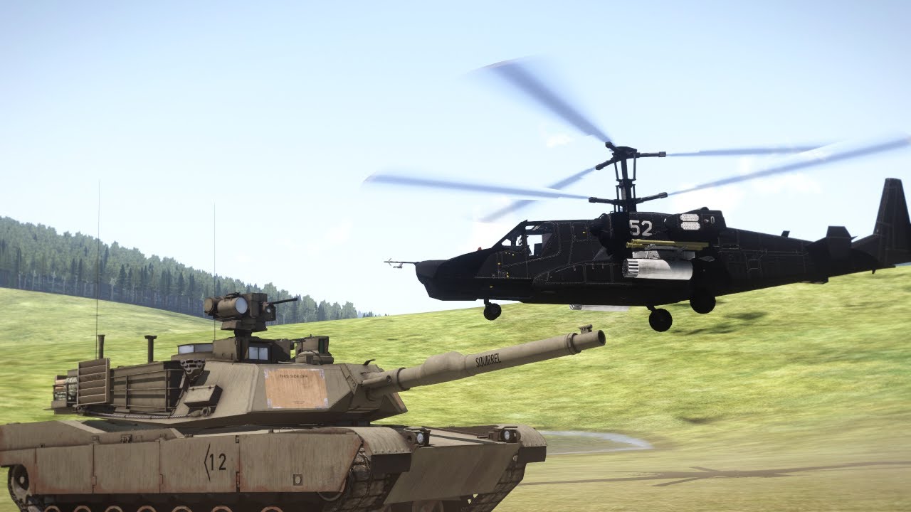 Combat helicopter ka-50 storming the town and tanks defending the town ...