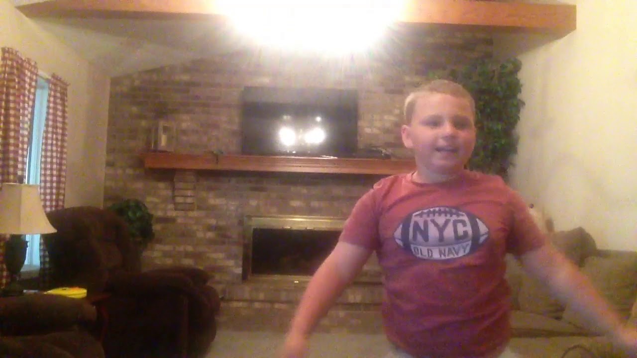 Doing a backflip off me couch - YouTube