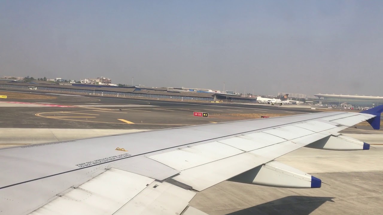 Flight landing at Mumbai runway - YouTube