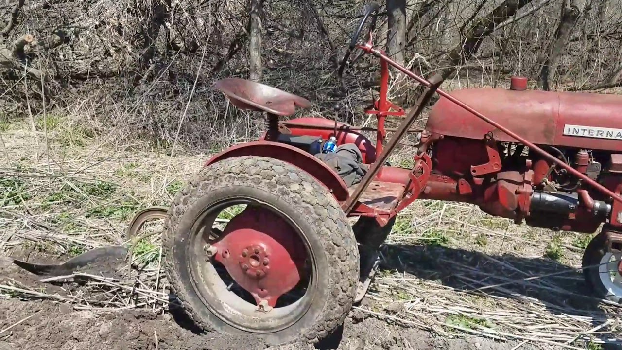 Farmall cub plowing - YouTube