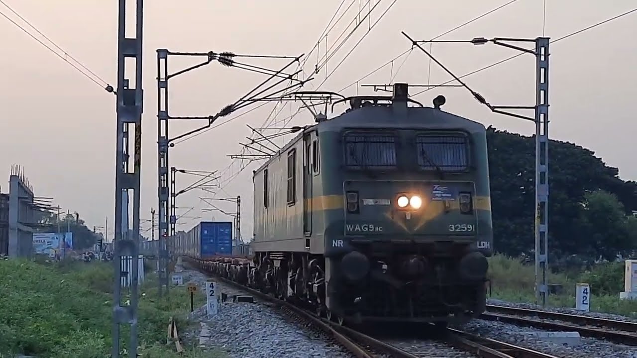 High Speed Freight train , Crazy WAG 9 Honking and Crossing ...