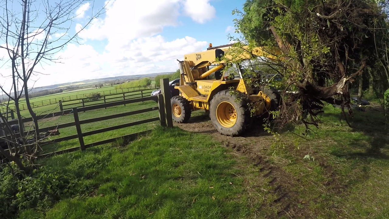 JCB teleporter clearing brash. - YouTube