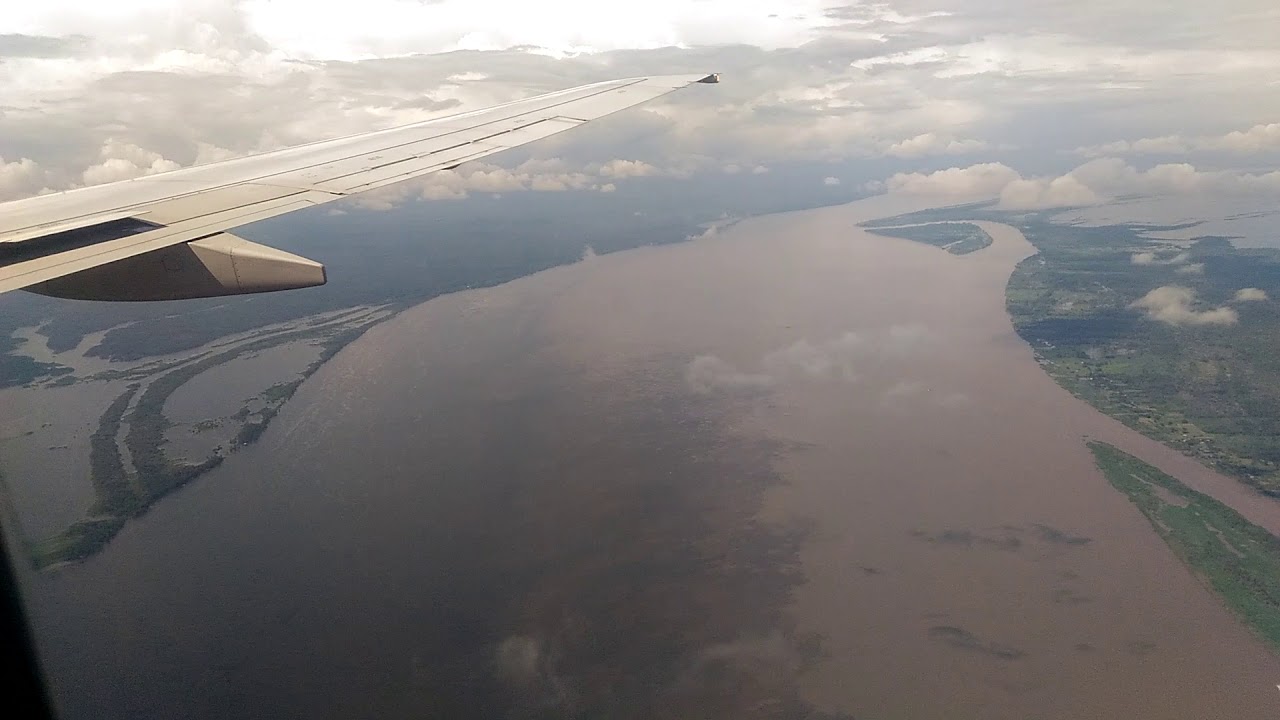 Encontro das águas Rio Negro e Rio Amazonas Chegada a Manaus - YouTube