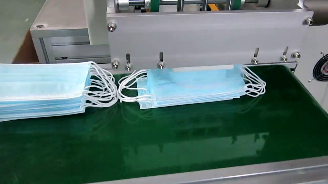 High speed face mask earloop welding machine with automatic feeder - YouTube