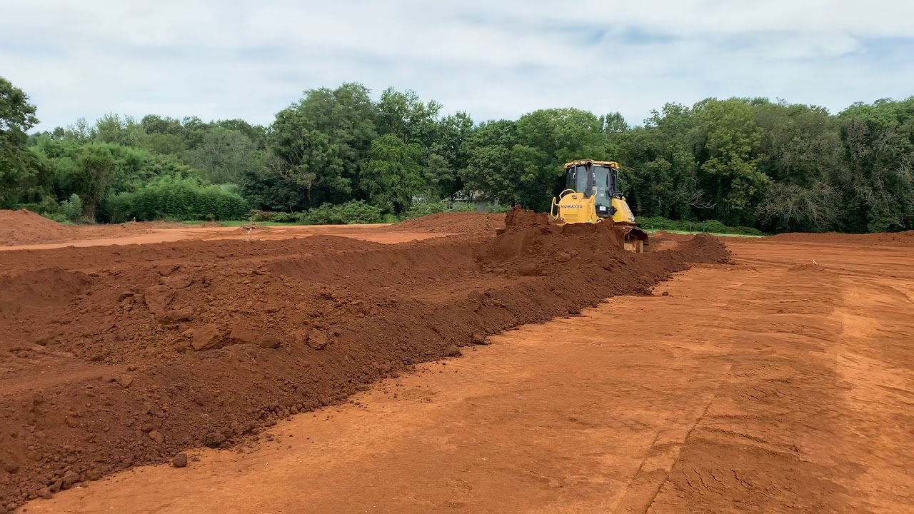 Komatsu D61 Slot dozing maximizing productivity - YouTube