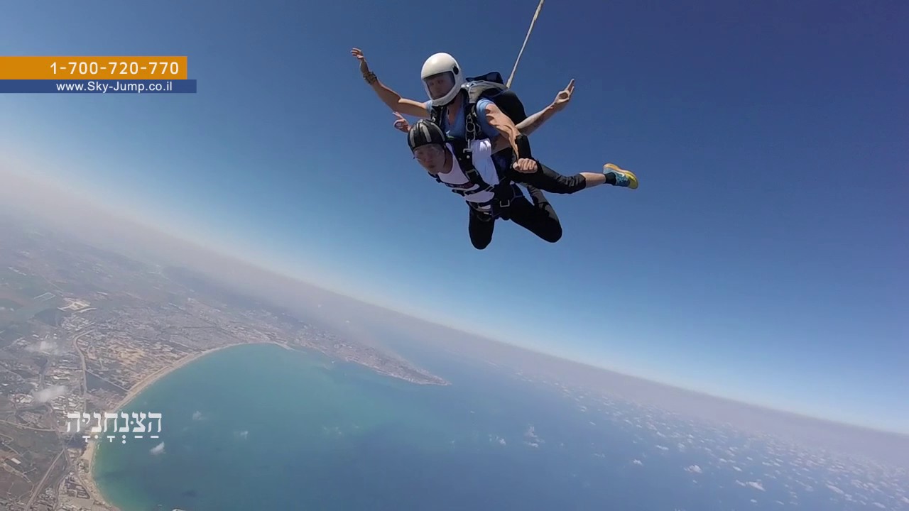 Zhou takes the leap at skydive Israel! - YouTube