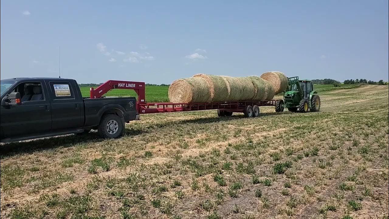 Hayliner Self unloading bale trailer. Canadian dealer - YouTube