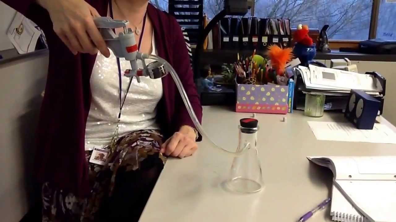 Adding air to a flask. - YouTube