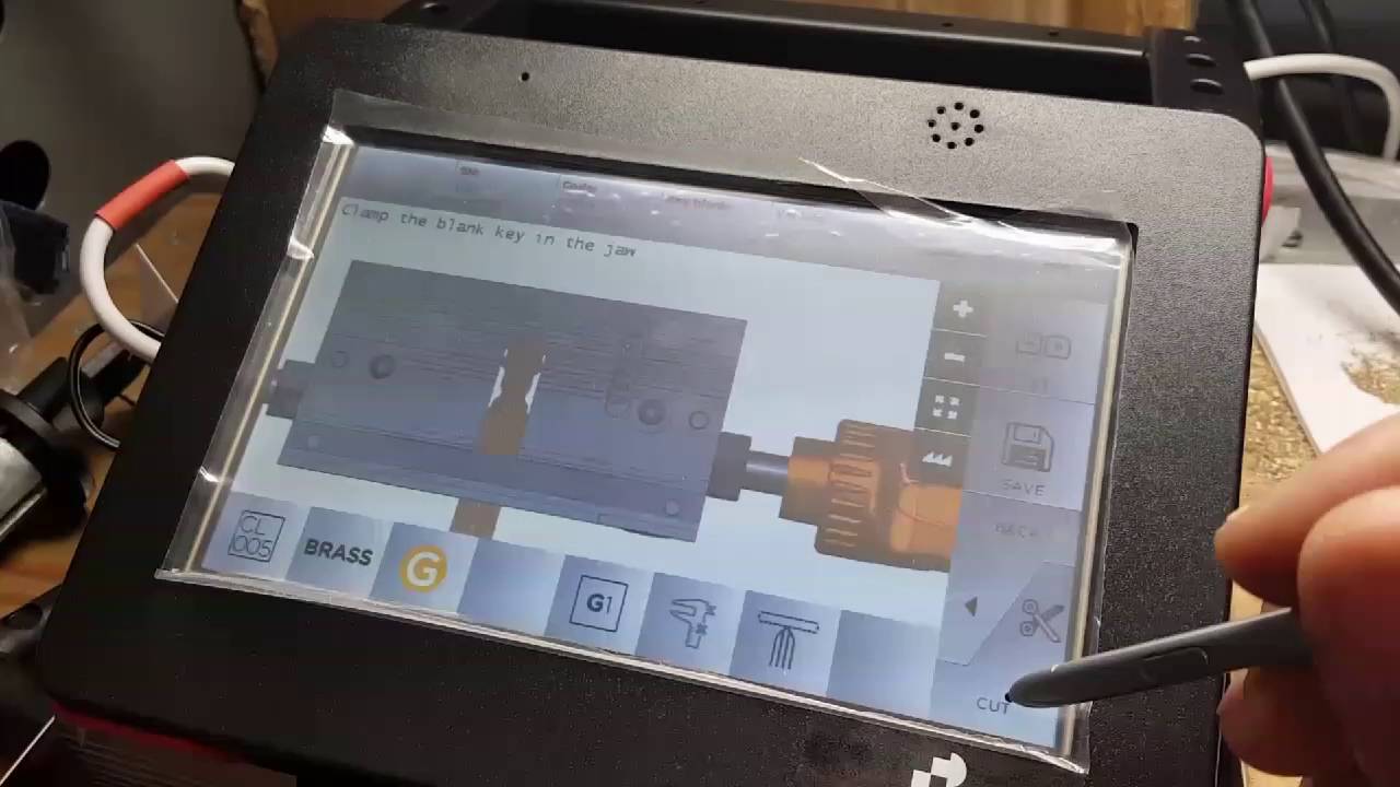 Cutting a Ford key by code. Keyline 994 Laser - YouTube