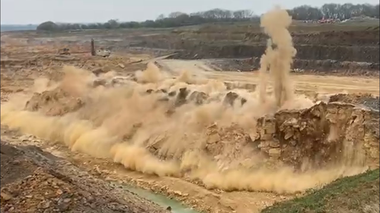 Dynamite and thousands of tonnes of rock getting blown up (boom) - YouTube