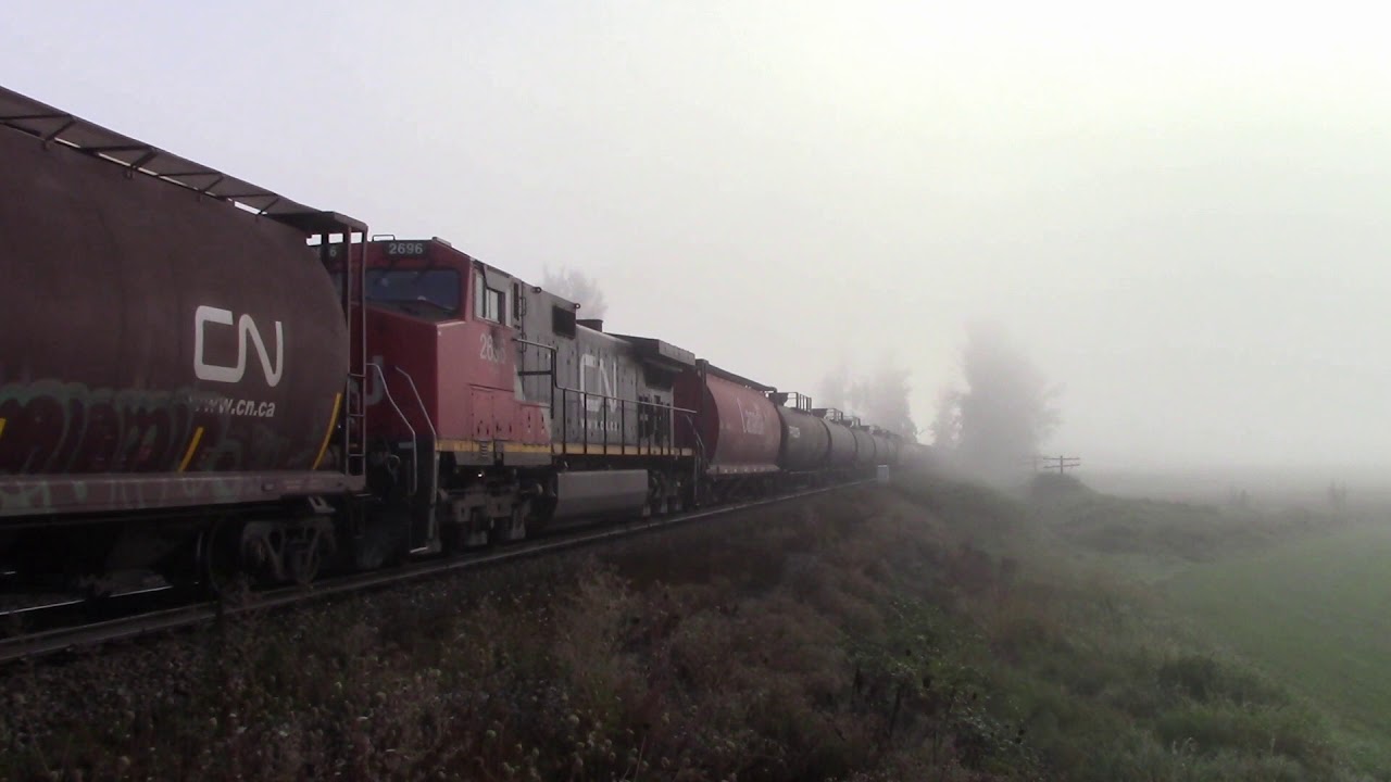 Trains BC 2018: CN 843 (Grain Train) W/ DPU @ Matsqui Jct. Canada 27AUG18 SD70M-2 8801 Leading ...