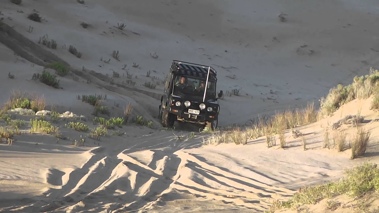 Land Rover Defender 4x4 in sand dunes - YouTube
