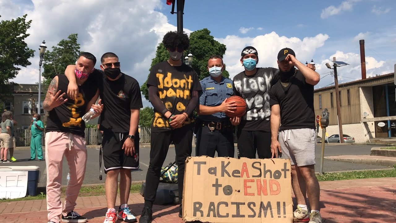 Protesters and officer play basketball at North Plainfield rally ...