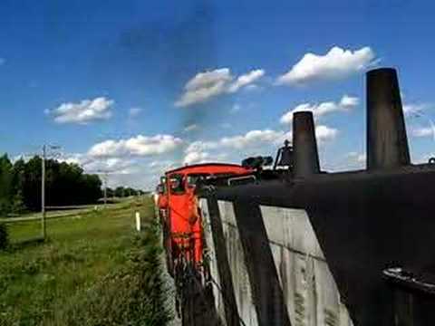 trio of GMD-1 locomotives pushing a train - cab view - YouTube