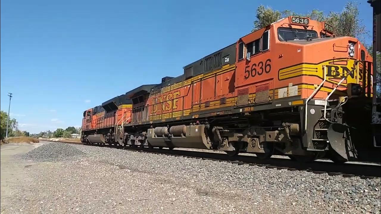 BNSF SD70ACe #9191 & BNSF AC44CW #5636 lead less than mile long loaded JOBX coal train passed M ...