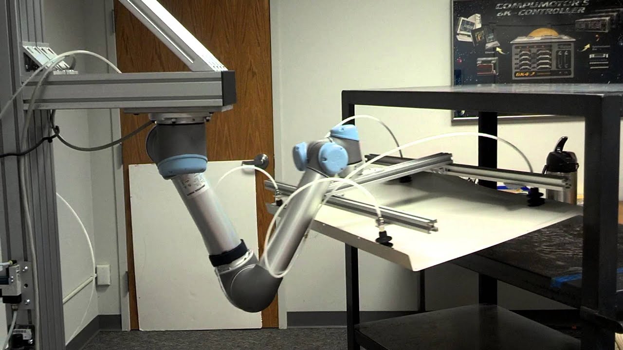Universal Robots Press unloading simulation - YouTube