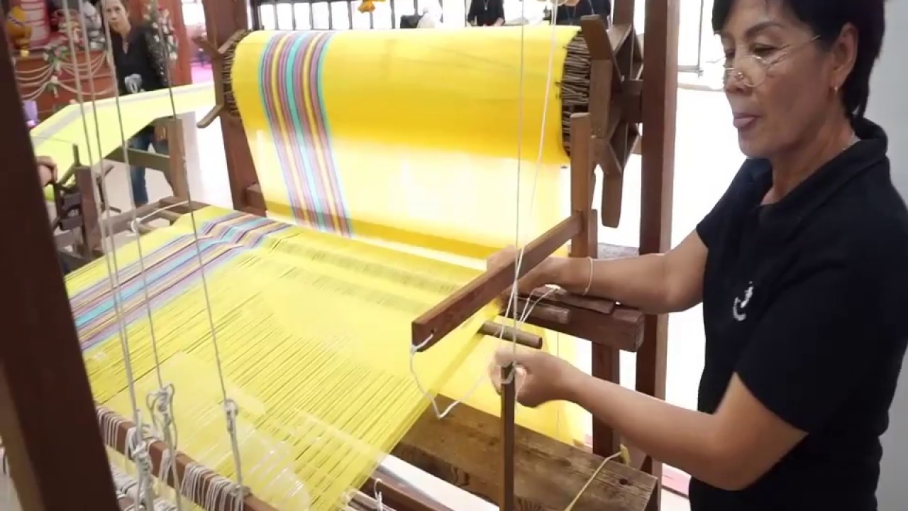 Cloth making with a Loom - YouTube