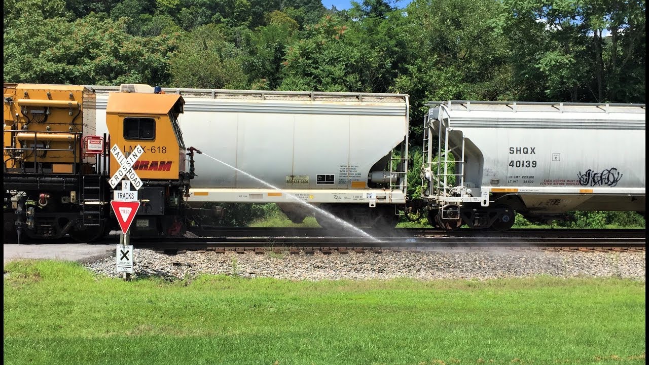 Loram Causes Crosstie Fire as NS 15T Passes - YouTube