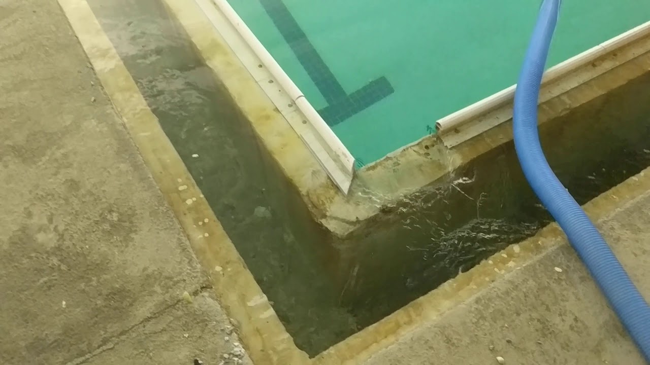 Deep End Corner Gutter near Parking Lot Doors - YouTube