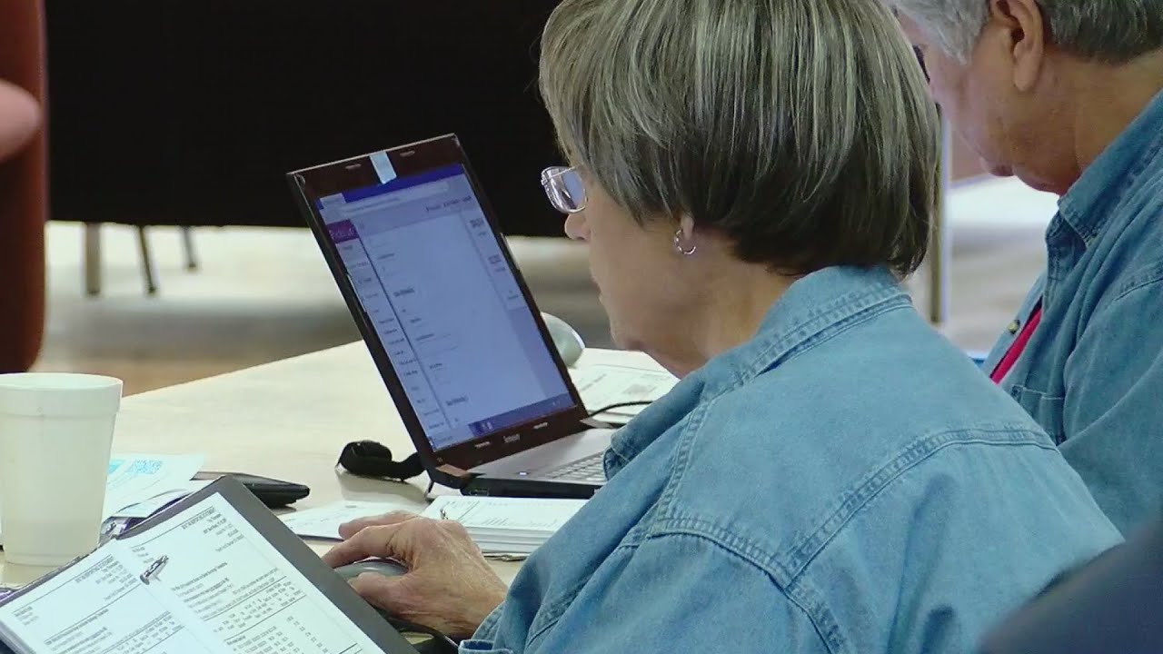 AARP Tax Aid program volunteers prepare for tax season - YouTube