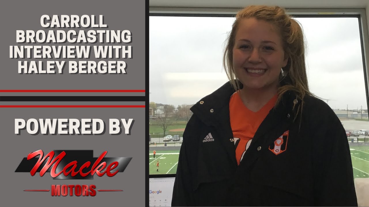 Tyler Brunner talks with Haley Berger of Carroll Tigers soccer after ...