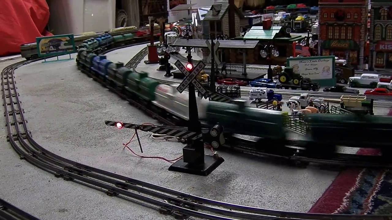Marx lighted dual crossing gates and block signal - YouTube