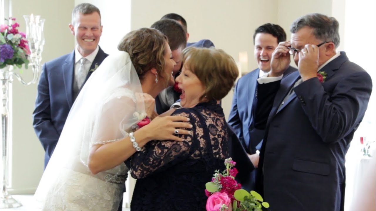 Bride and Mother-In-Law get STUCK together DURING ceremony! - YouTube