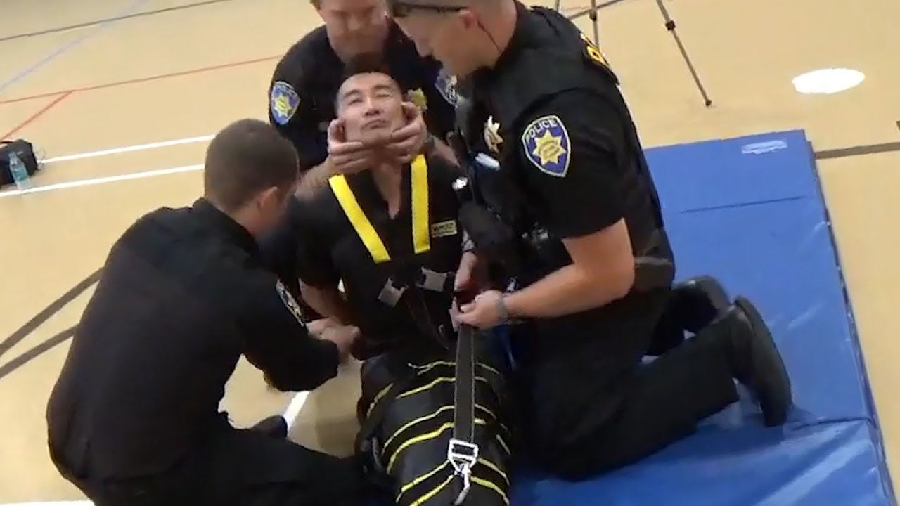 BREAKING: Video of New ICE Restraint for Detainees - YouTube