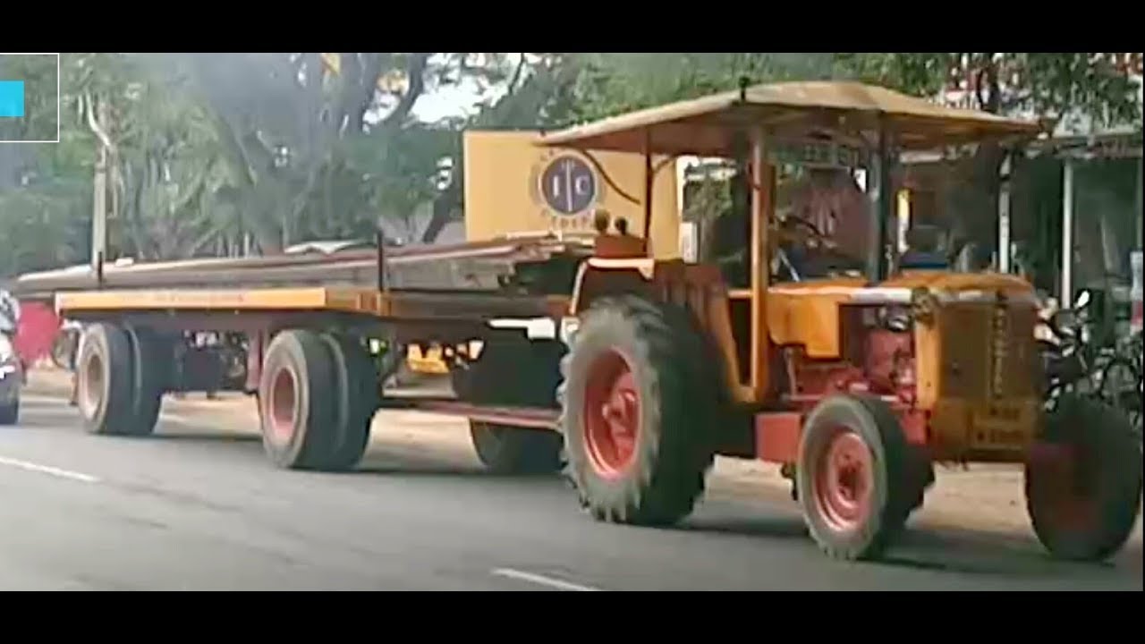 Tractor Pulling lengthiest 8 wheel semi trailer - Mahindra Gujarat ...