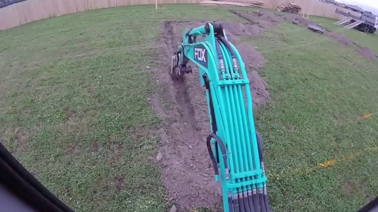 digging footings - YouTube