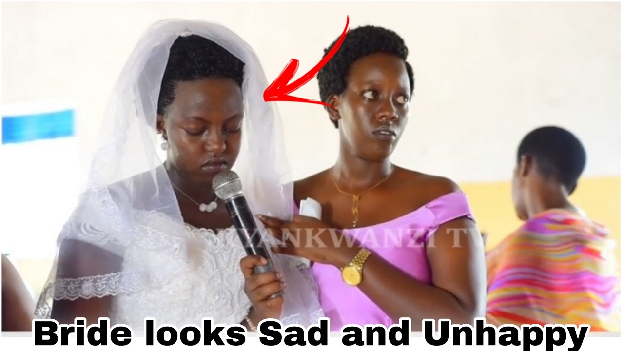 This Young Bride looks Sad, Unhappy and Moody on her Wedding Day & She ...