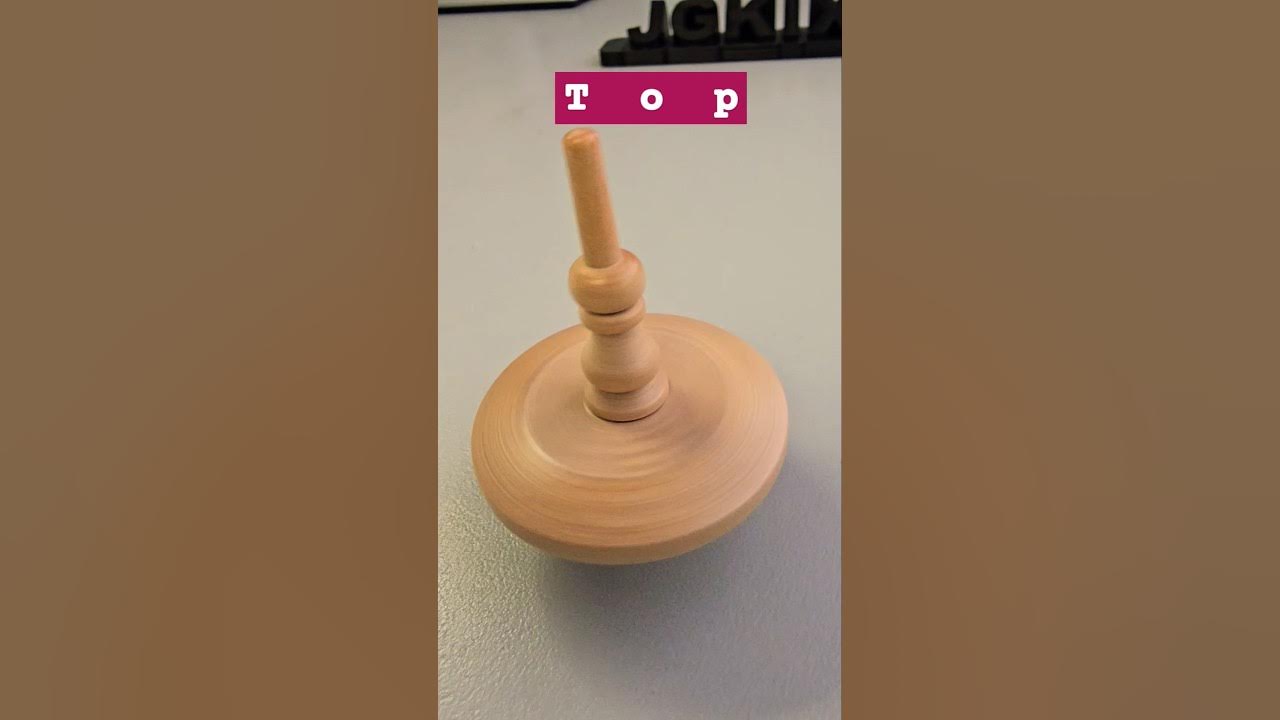 A wooden Toy Top #top#toy#woodentoy #fun #spin #excitement #jgkix - YouTube