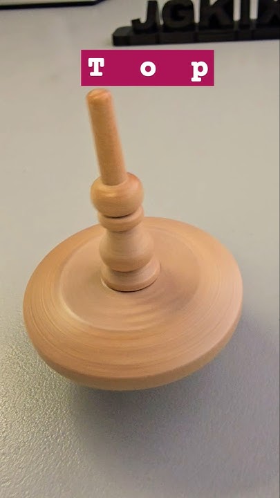 A wooden Toy Top #top#toy#woodentoy #fun #spin #excitement #jgkix - YouTube