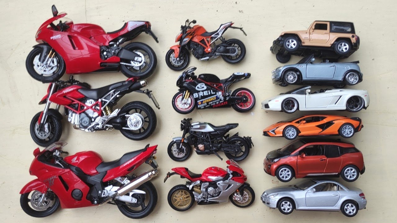 Box Full of Diecast Model Cars & Bikes, Ducati Bike, Honda CBR, KTM ...