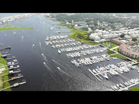 Intercoastal Waterway with Boats rushing into harbor ahead of storm.