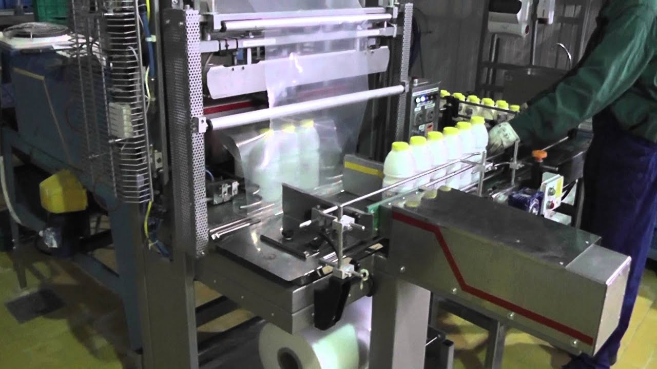 Pakowanie w folię butelek - YouTube