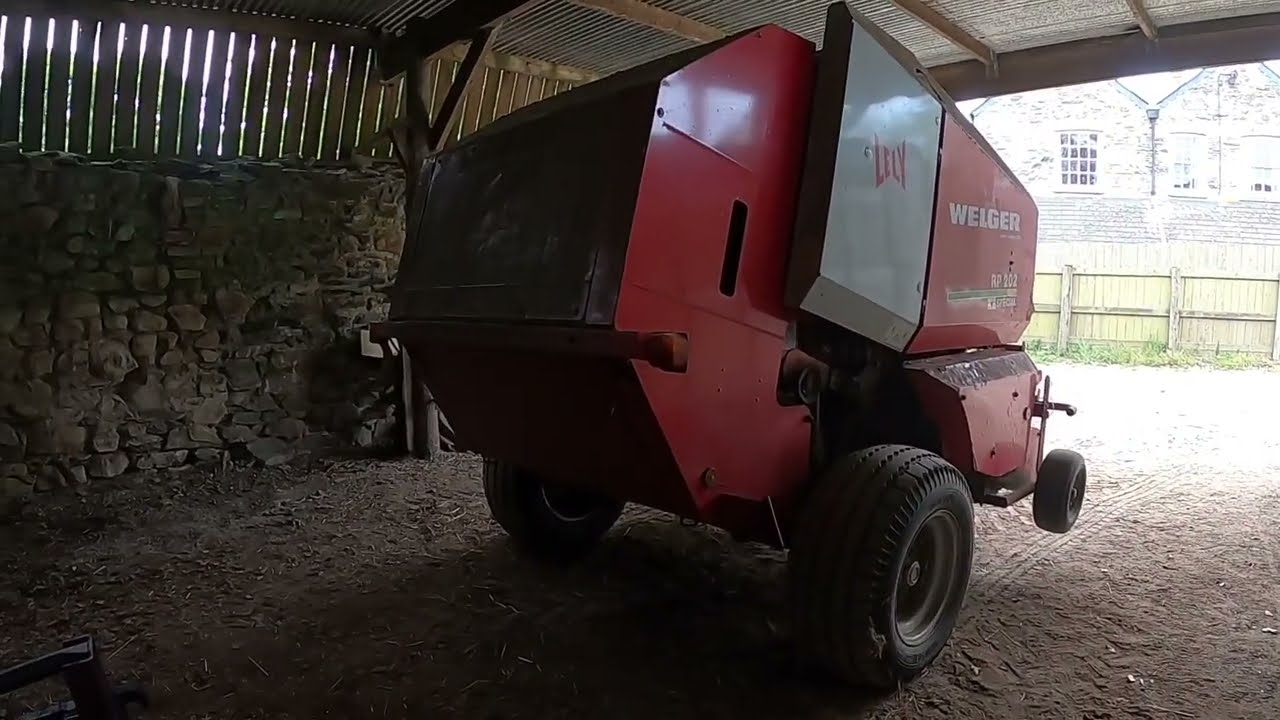 Lely Welger round baler service. - YouTube