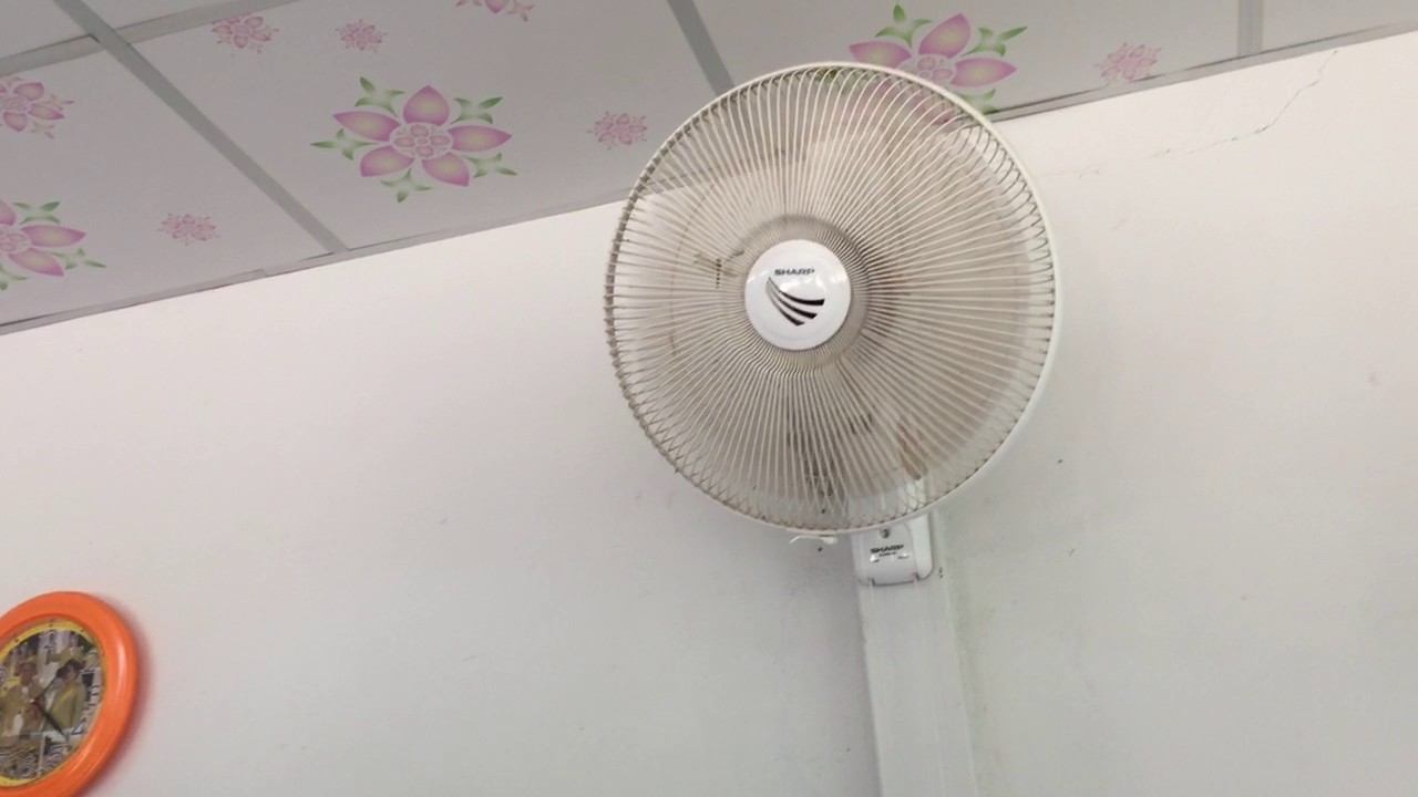 Sharp brand wall fan at a convenience store - YouTube