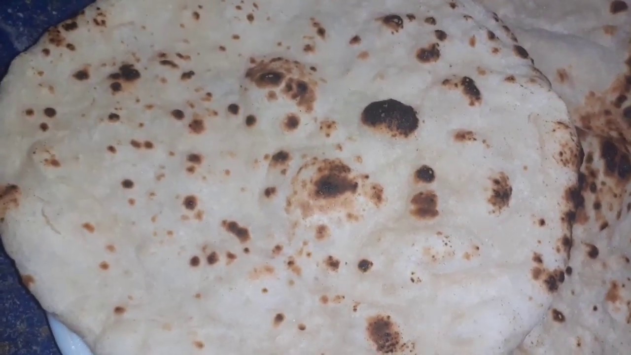 Homemade naan bread recipe on tawa easy way to make - YouTube