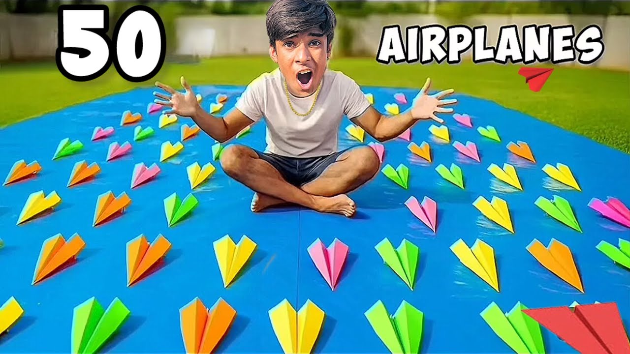 I Made 50 Paper Airplanes & FLUNG Them From A PLANE - YouTube