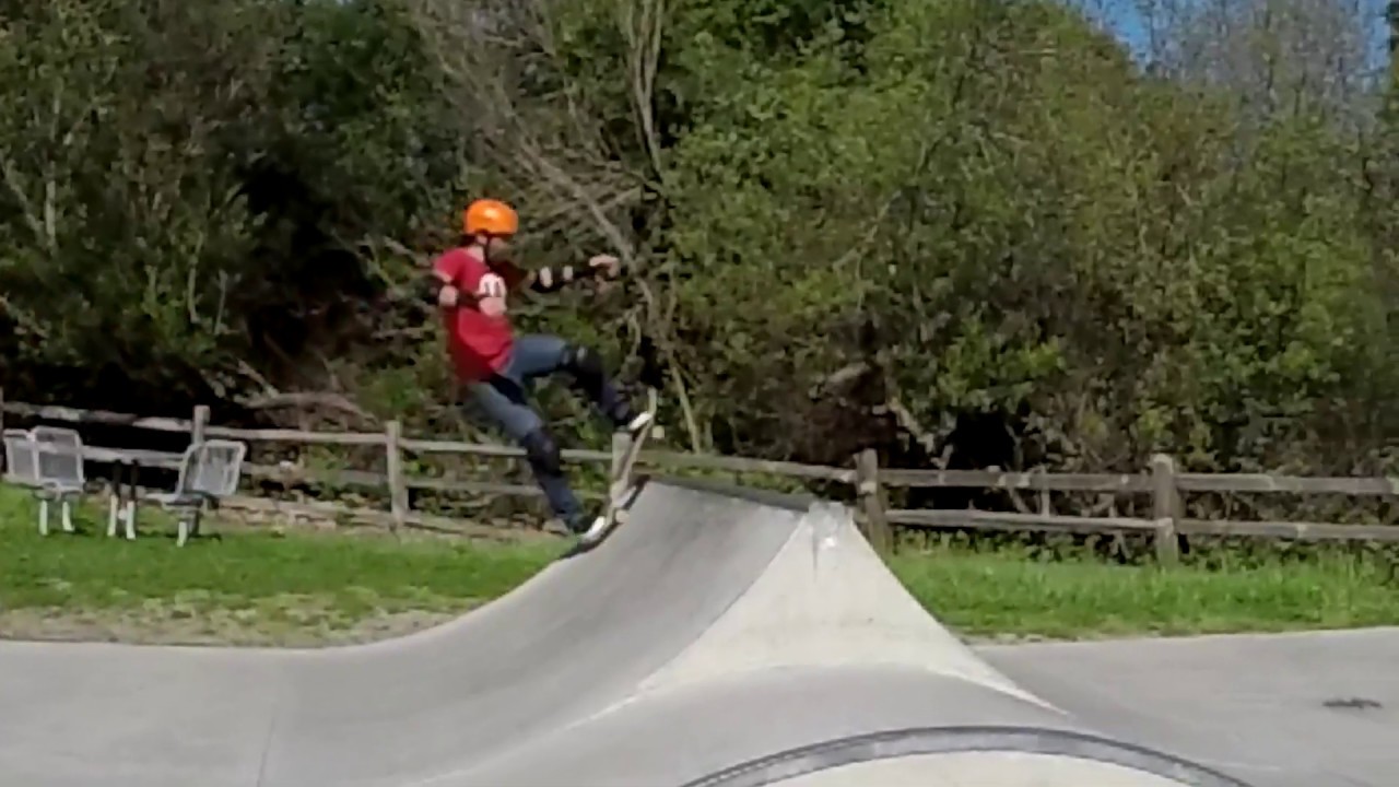 Skateboarding: Tail stall spine transfer and 5050 grind on the miniramp ...