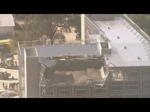 Building collapse sends 9 people to the hospital - YouTube