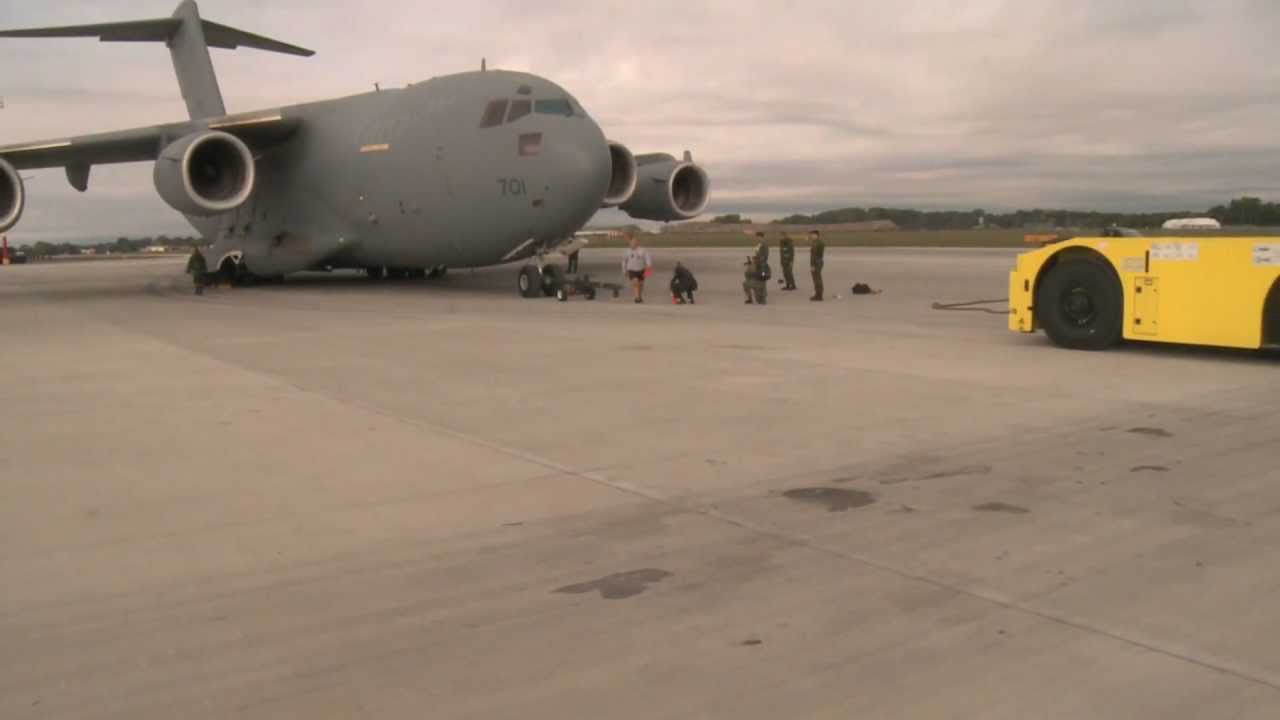 World's Strongest Man Pulls a C-17 Cargo Plane - YouTube
