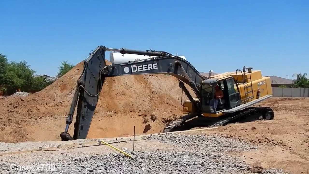 Deere 450D Excavator Digging Deep - YouTube