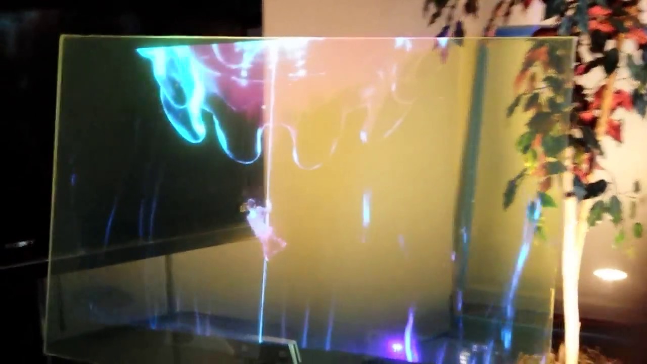 MediaGlass Fully Transparent Emissive Projection Display - YouTube