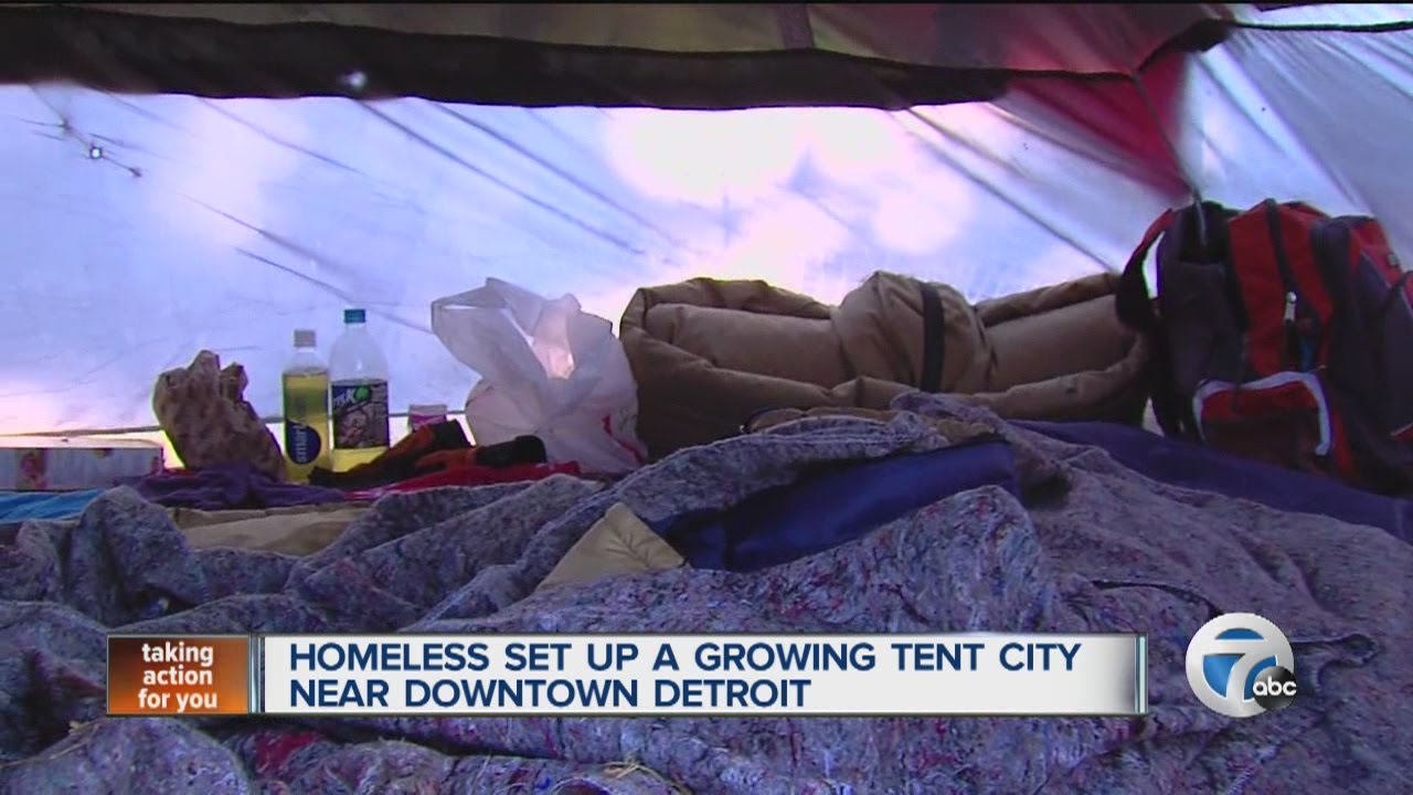 Homeless set up a growing tent city near downtown Detroit - YouTube