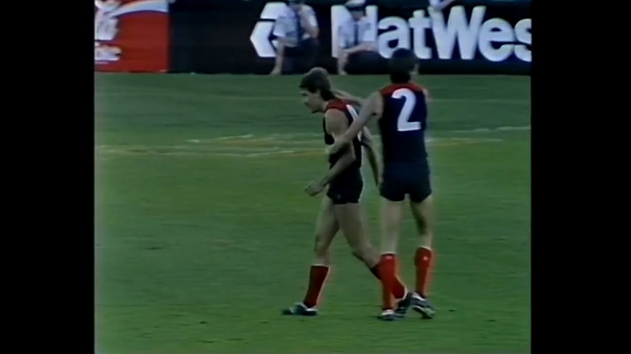 Alan Johnson kicks a goal after an excellent tackle from Robert Flower ...