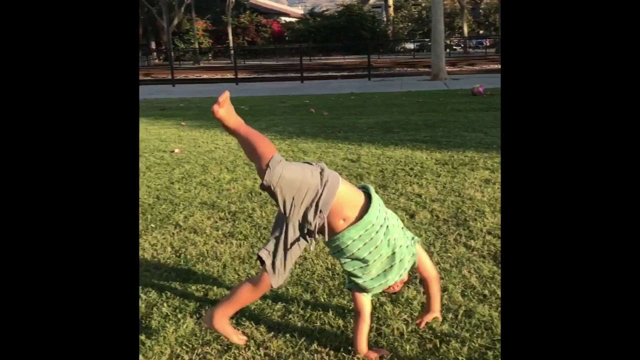 4 year old kid does awesome cartwheel - YouTube
